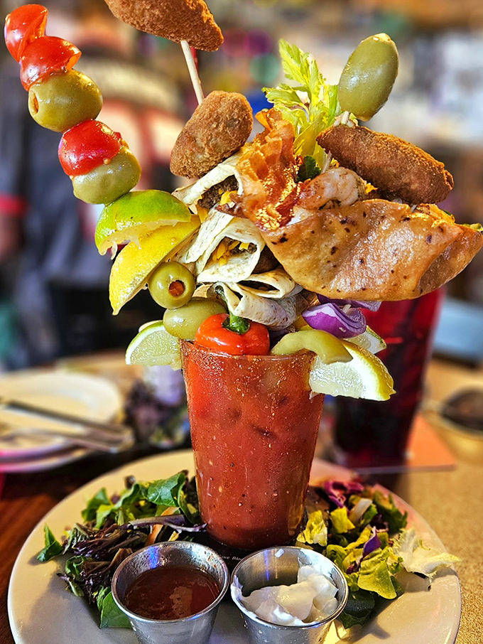 This isn't just a Bloody Mary—it's an entire appetizer course masquerading as a cocktail. The olive skewer alone deserves its own zip code.