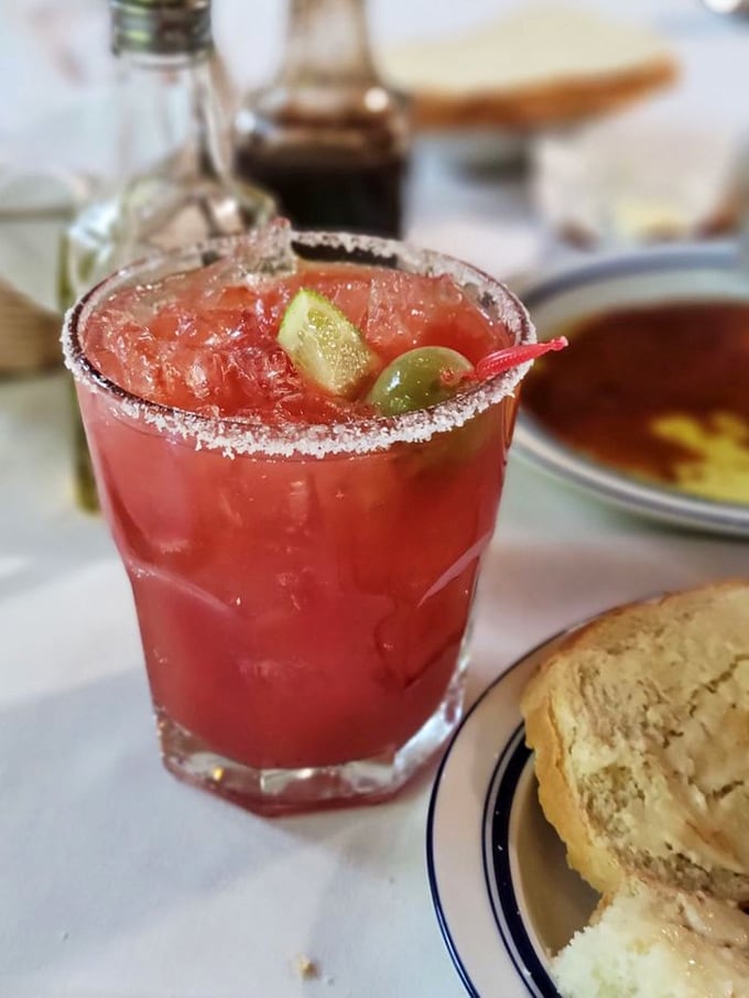 This isn't just a Bloody Mary—it's a spicy, salt-rimmed prelude to the French feast that awaits. The garnish is just showing off.