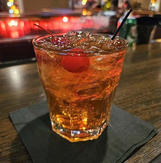 The iconic Wisconsin Brandy Old Fashioned Sweet – liquid amber topped with a cherry, the unofficial handshake of supper club culture.