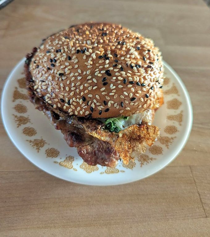 This isn't just breakfast between bread – it's morning salvation with a golden sesame crown that deserves its own zip code.