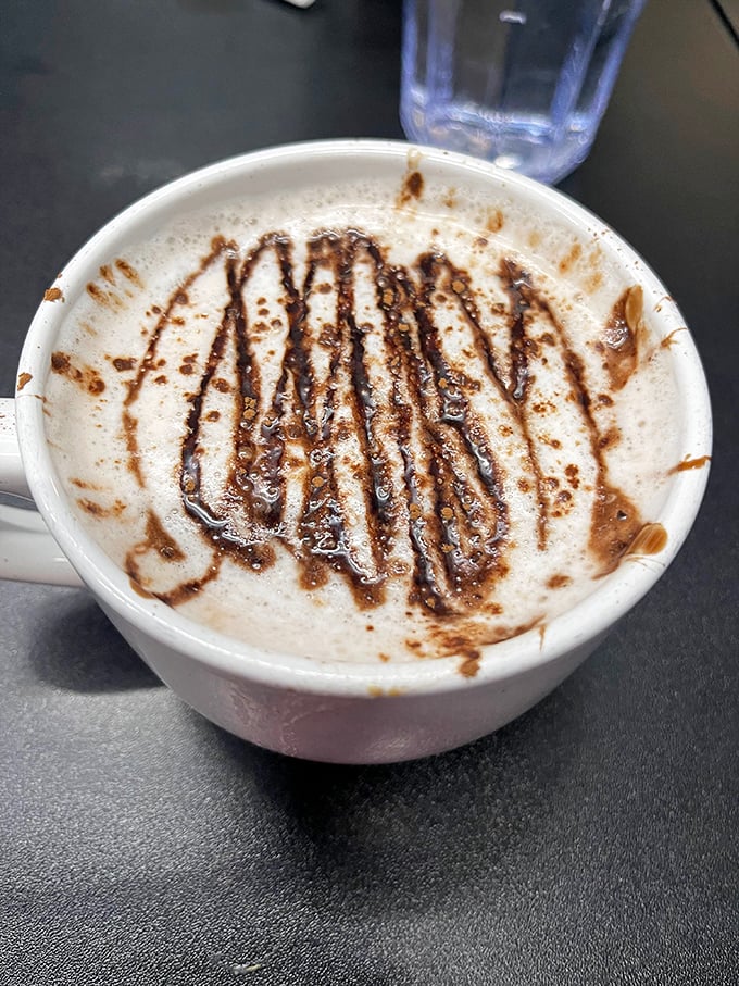 This cappuccino isn't just coffee; it's liquid motivation artfully drizzled with chocolate – morning fuel that doubles as an Instagram opportunity.