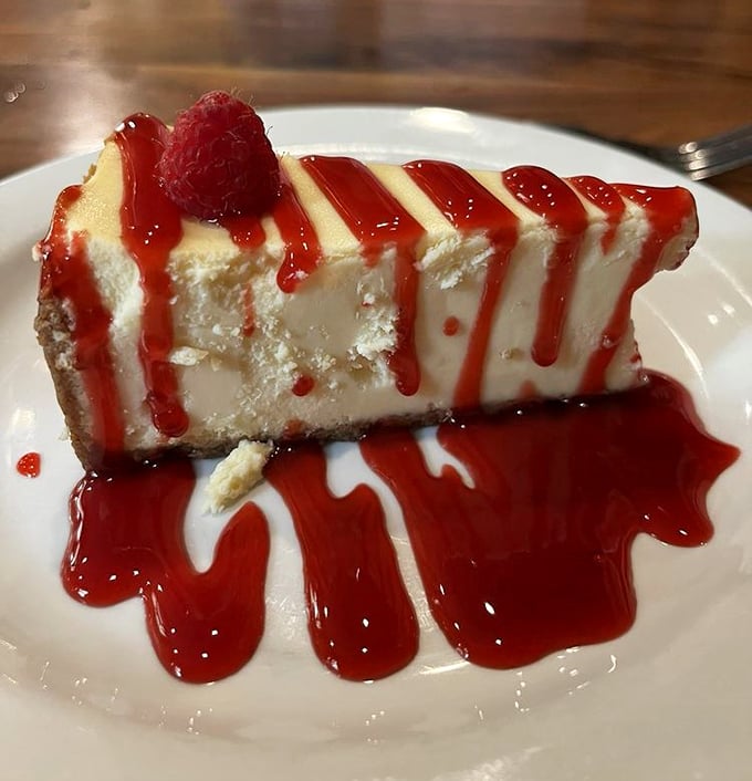 This cheesecake with raspberry sauce isn't just dessert—it's the grand finale your taste buds have been waiting for all evening.