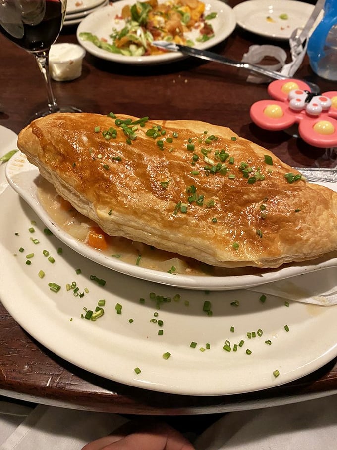 This Chicken Pot Pie isn't just baked – it's been lovingly coaxed into golden perfection, its flaky roof barely containing the savory treasures within.