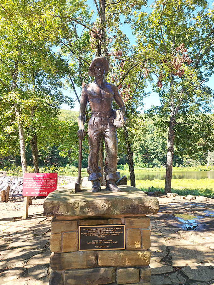 Standing tall among the trees, this bronze CCC worker commemorates the young men who traded Depression-era unemployment for building America's outdoor treasures.