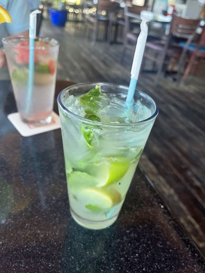 Not just a mojito—a vacation in a glass. Those mint leaves are doing the important work of making Tuesday feel like Saturday.
