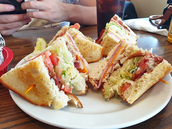 The club sandwich – architecture you can eat. Layers of deliciousness stacked higher than my unread emails, with each bite better than the last.