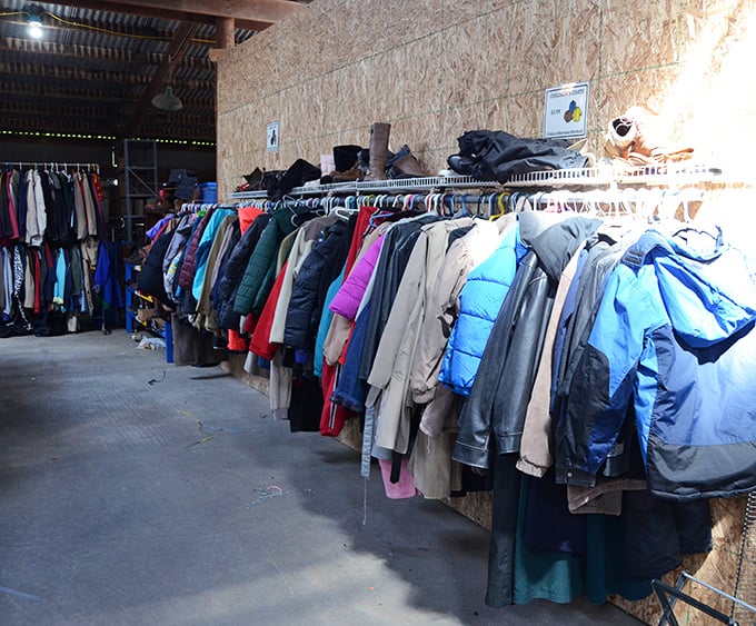 The coat section: where winter preparedness meets fashion archaeology. Each jacket tells a story of seasons past.