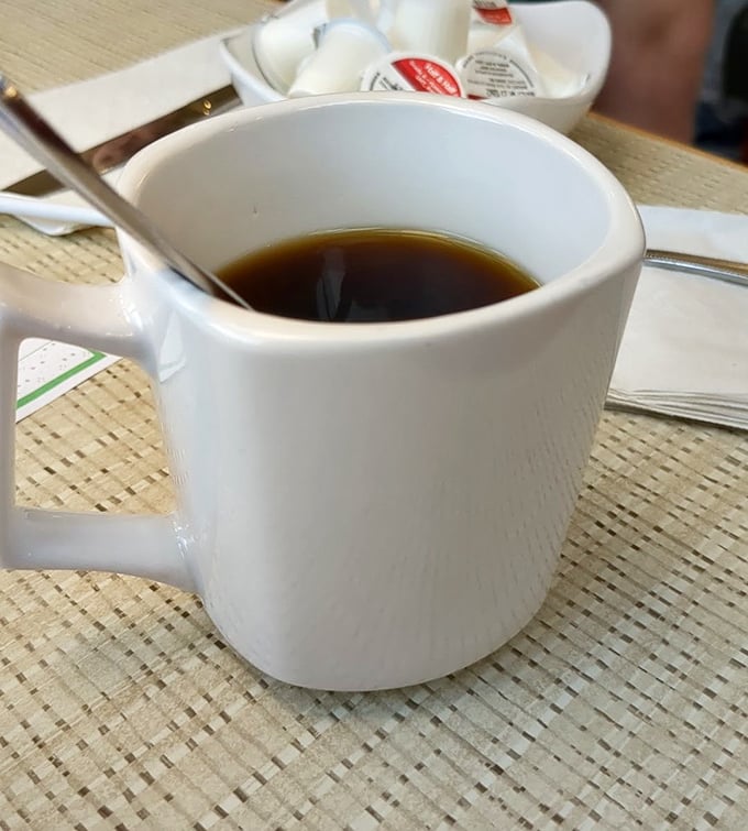The unsung hero of breakfast—a humble mug of coffee that's seen more morning revelations and weekend plans than a therapist's notebook.
