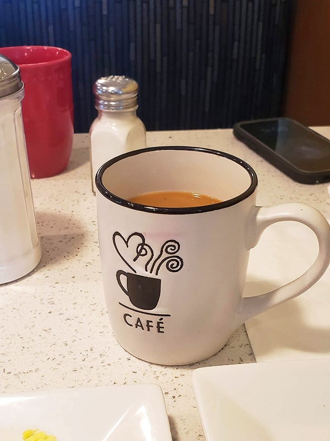 That first sip of coffee at The Legend—when the mug is substantial and the brew inside is even more so.