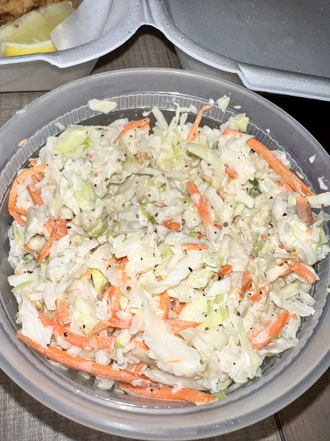 Not just any coleslaw – this crisp, fresh cabbage medley is the supporting actor that deserves its own Oscar in the seafood feast drama.