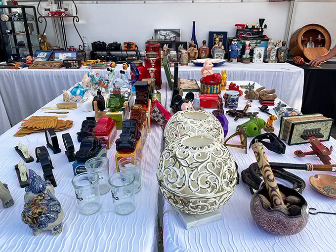 Every table tells a story through its carefully arranged artifacts—ceramic treasures and wooden carvings waiting to become the perfect "where did you find that?" piece.