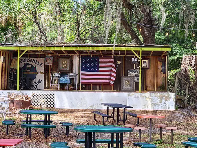 Pure Americana served with a side of nostalgia. This rustic outdoor stage celebrates Brooksville's small-town charm with patriotic flair.