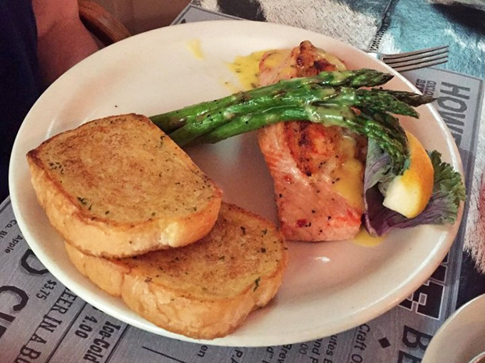 Seafood meets land-locked Oregon in this perfect plate. Garlic toast, salmon, and asparagus—the holy trinity of "I'm treating myself tonight."