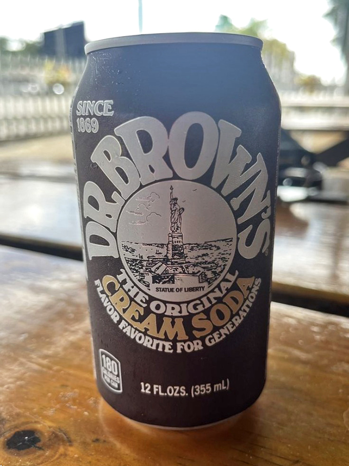 Dr. Brown's cream soda—the unofficial beverage of serious hot dog enthusiasts since 1869. Pairs with encased meats like Sinatra with a microphone.