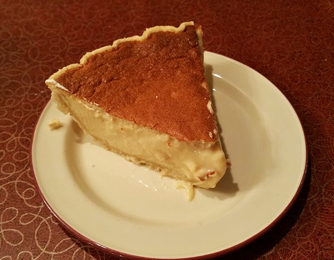 Custard pie with that perfect wobble – the kind grandmothers fight over at family reunions.