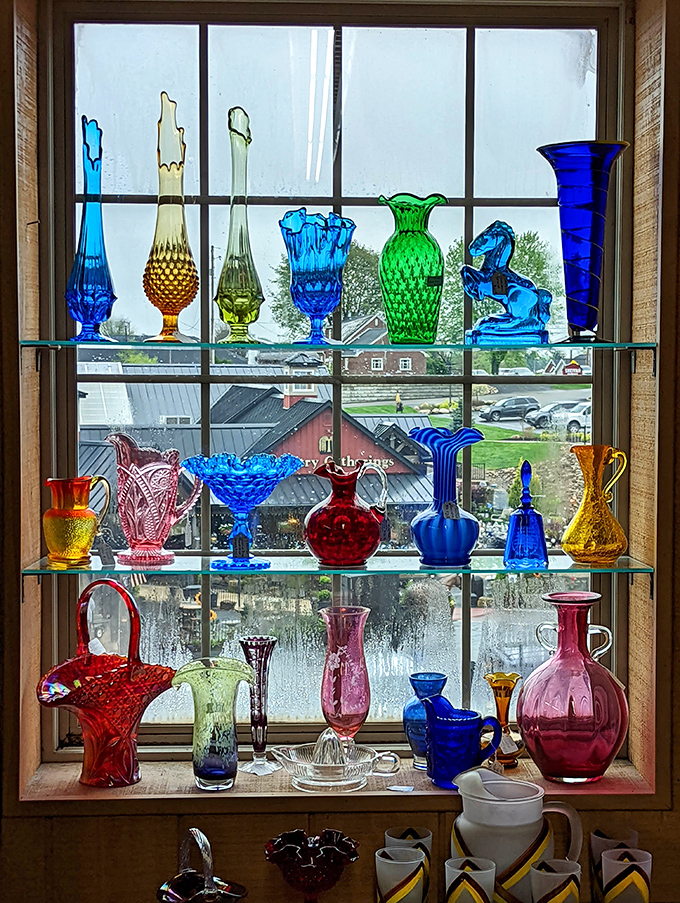 Sunlight transforms colored glass into a stained-glass cathedral of collectibles – each piece catching the light like jewels in a treasure chest.