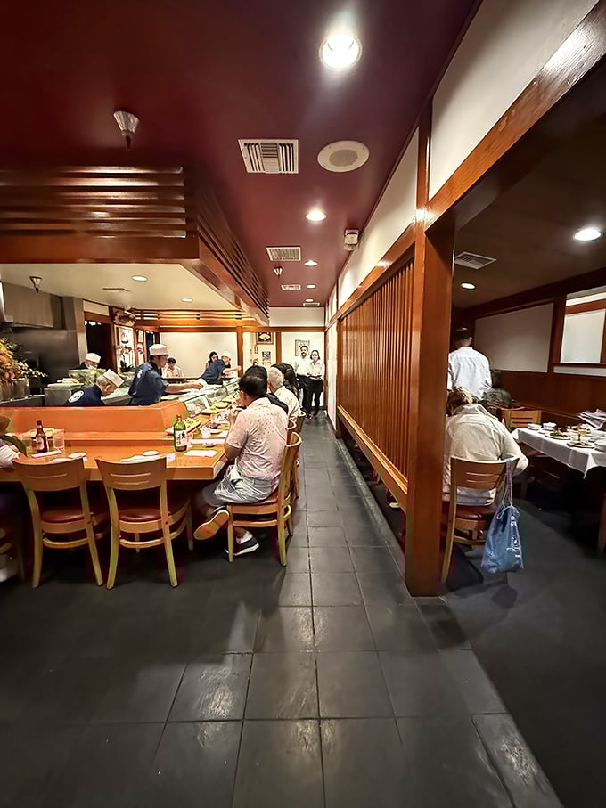 Sushi Gen's interior reveals its true character—not in flashy decor, but in the focused attention of diners lost in the moment of culinary bliss.