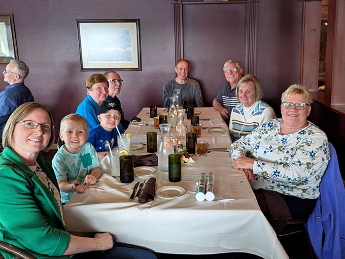 Three generations gathered around white tablecloths—exactly the kind of scene that makes supper clubs timeless Wisconsin institutions.
