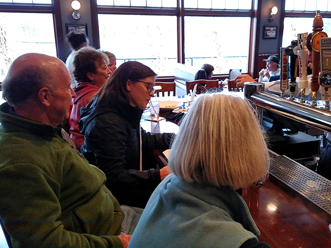 The bar area—where strangers become friends and "just one more" becomes the evening's most repeated phrase.