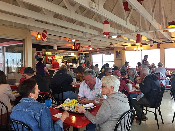 Generations of seafood lovers have stood before these counters, contemplating life's most important question: one lobster roll or two?