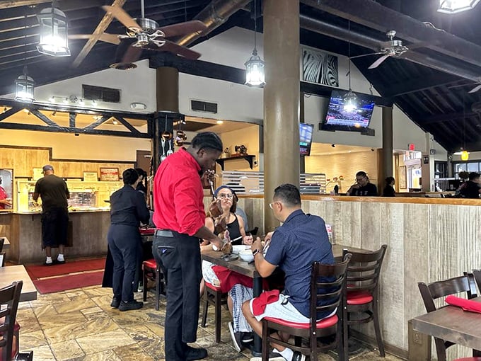 The tableside service is where the magic happens—that moment when your gaucho arrives with a skewer of perfectly grilled meat is better than Christmas morning.