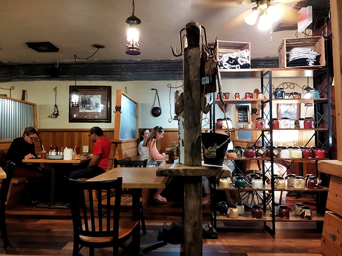 The dining area's rustic charm comes complete with vintage shelving displaying local treasures—proof that atmosphere is as important as appetite in Julian.