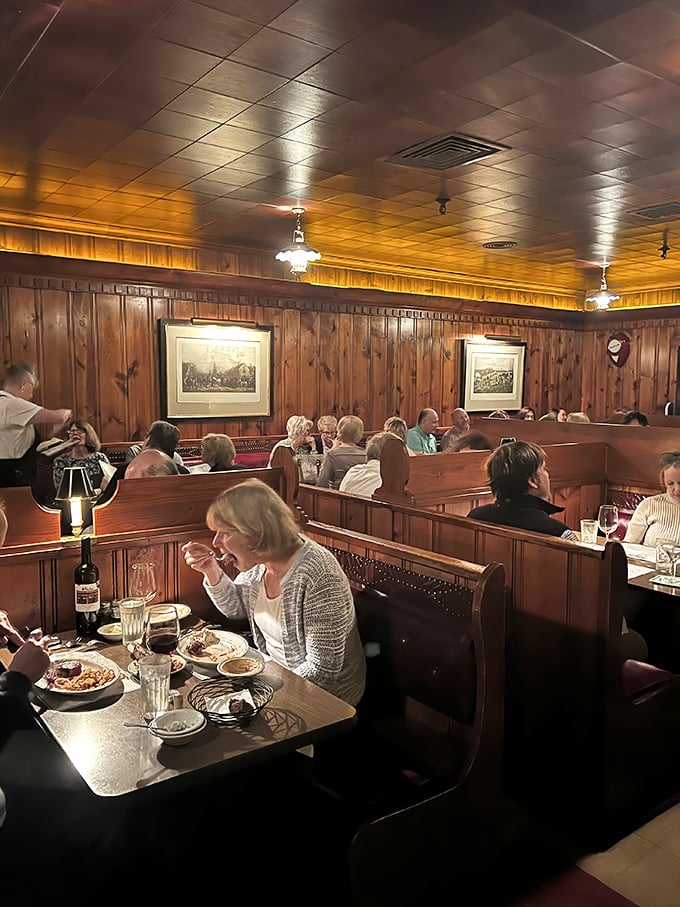 Diners lost in the ritual of the perfect bite – the outside world fades away when you're in the presence of beef prepared with reverence.