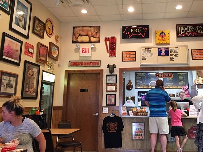 Where BBQ dreams come true—customers line up at the counter while walls plastered with pig paraphernalia set the proper mood.