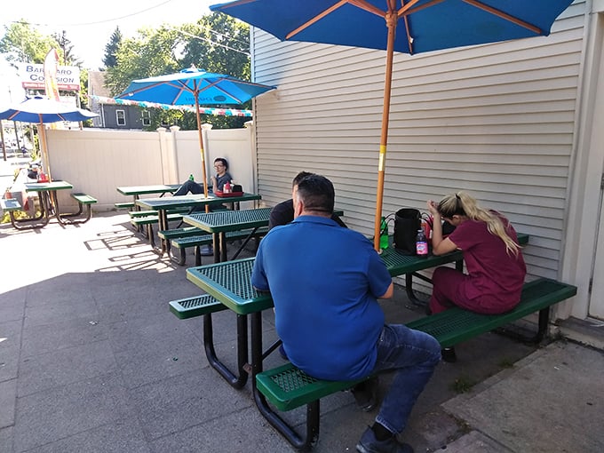 Outdoor tables offer fresh air with your feast—because sometimes paradise is a picnic table with a perfect burger.