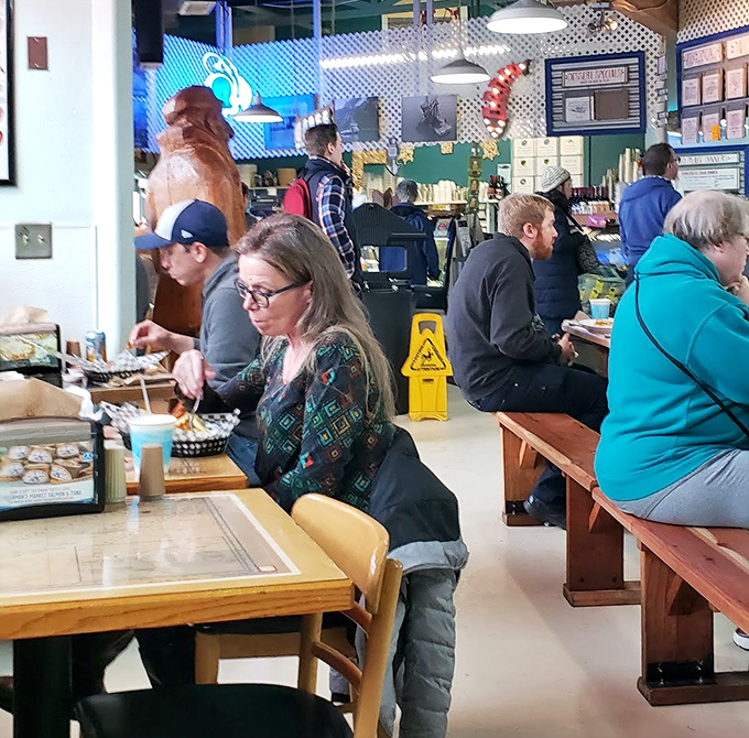 The bustling dining room speaks volumes—locals don't line up like this unless something truly special is happening on their plates.