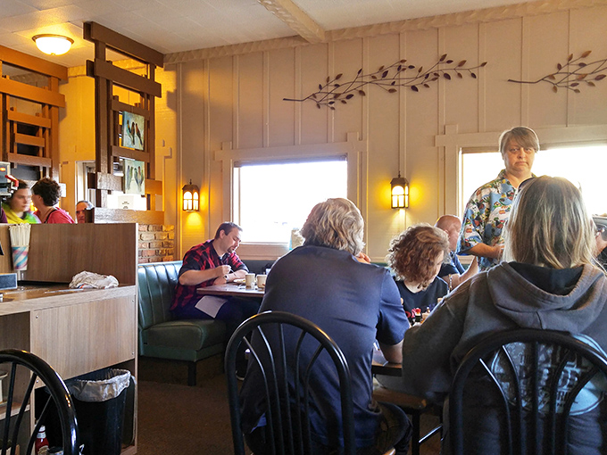 The dining room hums with the energy of regulars and newcomers alike, all united in the universal language of good food and better conversation.