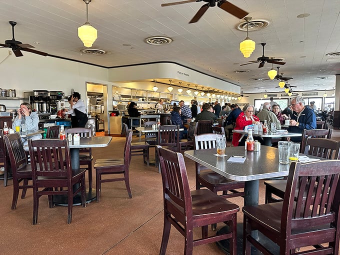 Where locals and travelers unite in the universal language of "mmm" and "pass the syrup"—Monument Cafe's dining room is democracy in action.