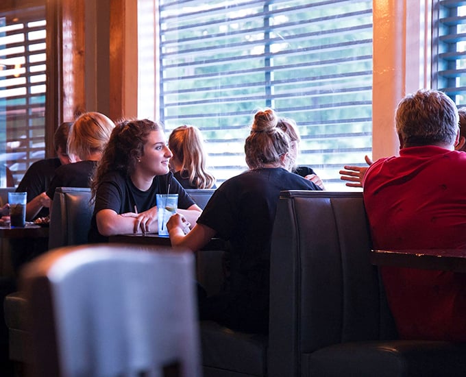 Booths filled with diners engaged in that universal language of good food—animated conversation punctuated by satisfied silence.