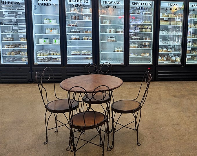 That small table by the refrigerated cases invites you to sit, relax, and contemplate which treats deserve immediate versus delayed gratification.