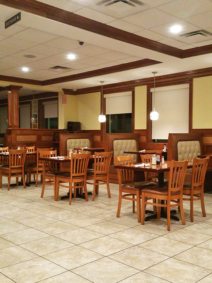 Booths with tufted cushions offer the perfect balance of comfort and support—like therapy, but with the promise of pancakes.