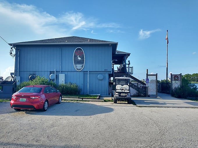 The blue building with the pink flamingo says it all—island dining should never take itself too seriously, but the seafood is serious business.