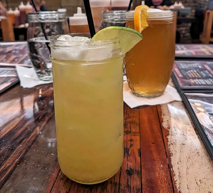 These aren't just drinks; they're palate cleansers between bites of smoky perfection. The lime isn't garnish—it's necessary balance in a world of rich flavors.