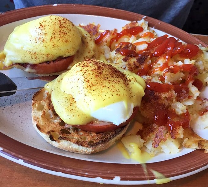 Eggs Benedict done right—the hollandaise sauce blankets those English muffins like a warm, lemony comforter on a chilly morning.