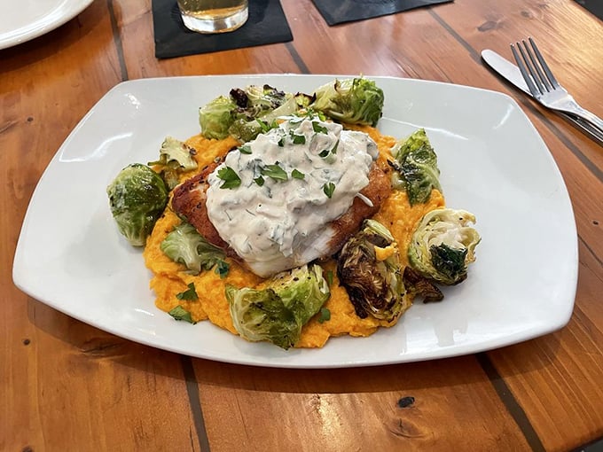 When fish meets comfort food and falls madly in love. Crispy-topped fish nestled on roasted Brussels sprouts and sweet potato puree—a romance worth savoring.