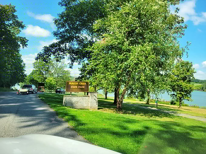 The entrance sign promises what lies beyond – a slice of Pennsylvania paradise where cell service fades but connection strengthens.