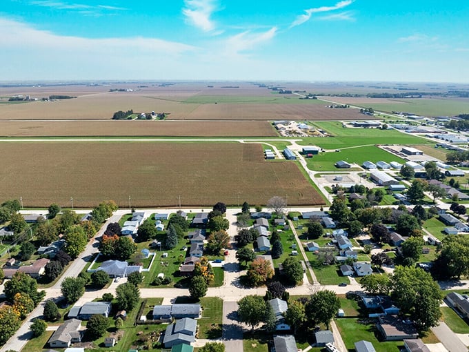 Where farmland meets neighborhood—Osage's edges blur into the agricultural tapestry that has sustained Iowa for generations.