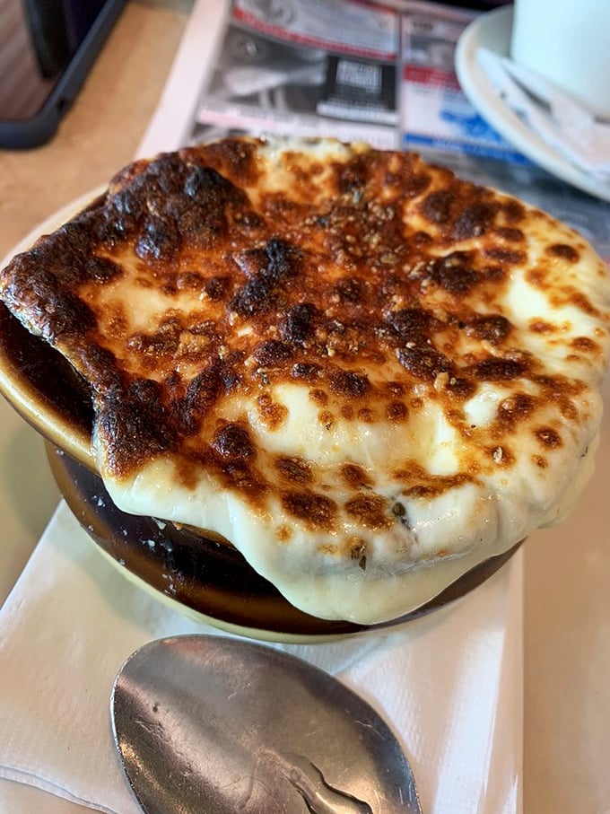 French onion soup with a cheese cap so perfectly broiled, it deserves its own Instagram account and possibly representation by a talent agency.