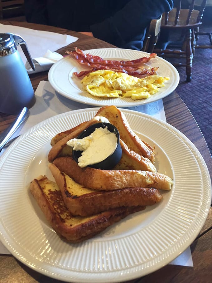 French toast that makes you understand why people line up in the morning cold – golden, crisp edges giving way to custardy centers.