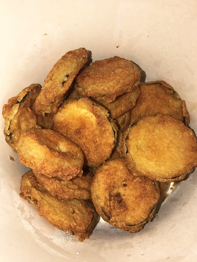 Fried eggplant discs that could convert any vegetable skeptic. Crispy on the outside, tender within—nature's chicken alternative done right.
