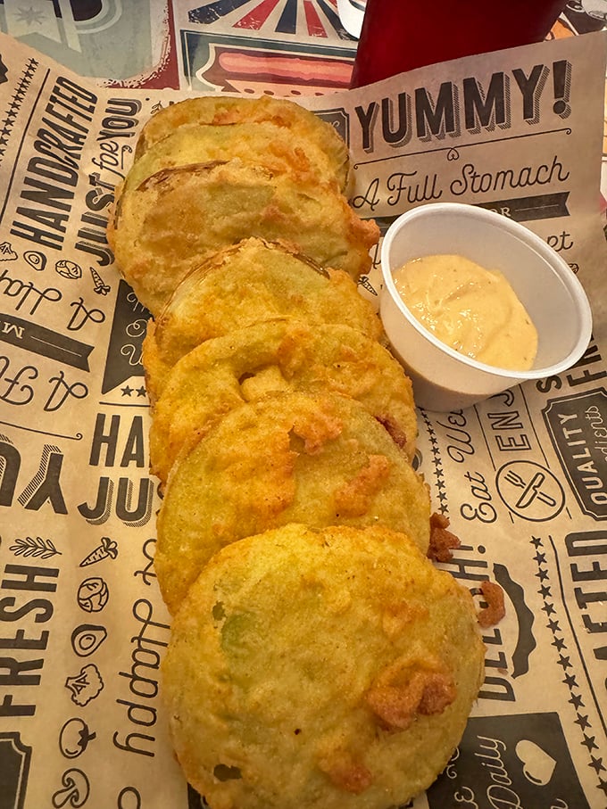 Fried green tomatoes—where Southern tradition meets culinary magic, transforming tart fruit into crispy discs of pure comfort.