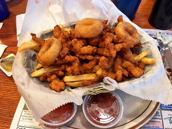 A basket of fried clam strips and fries that would make Neptune himself swim to shore. The perfect marriage of land and sea, united by hot oil.