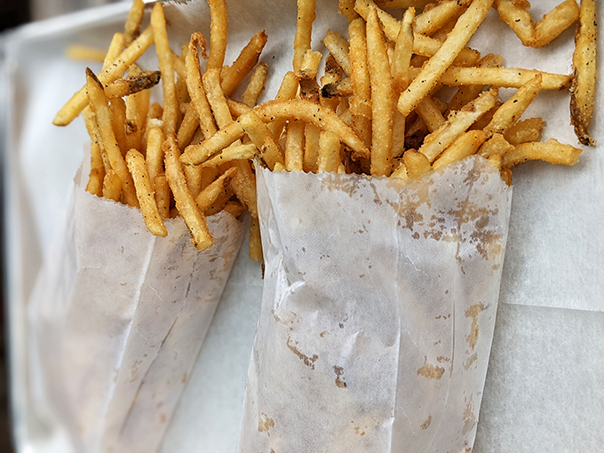 Fries so perfectly golden they deserve their own trophy. These aren't just potato sticks—they're vehicles for delivering any remaining sauce to your face.