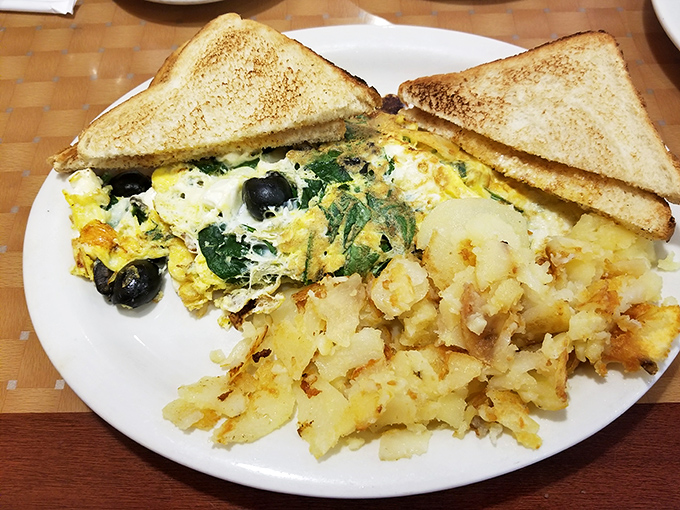 A Greek-inspired frittata that brings olives, spinach and feta to the breakfast table—proof that eggs can dress fancy even at dawn.