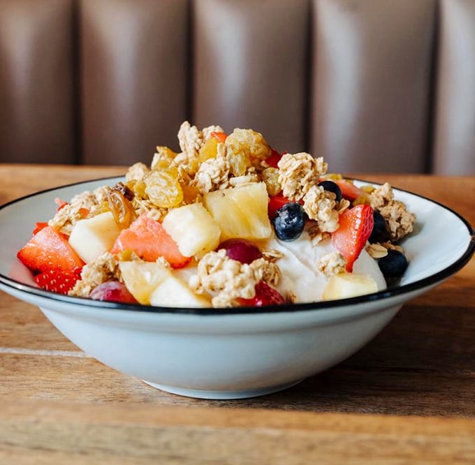 A fruit and yogurt bowl that doesn't apologize for being healthy—because something this beautiful and delicious has nothing to be sorry for.