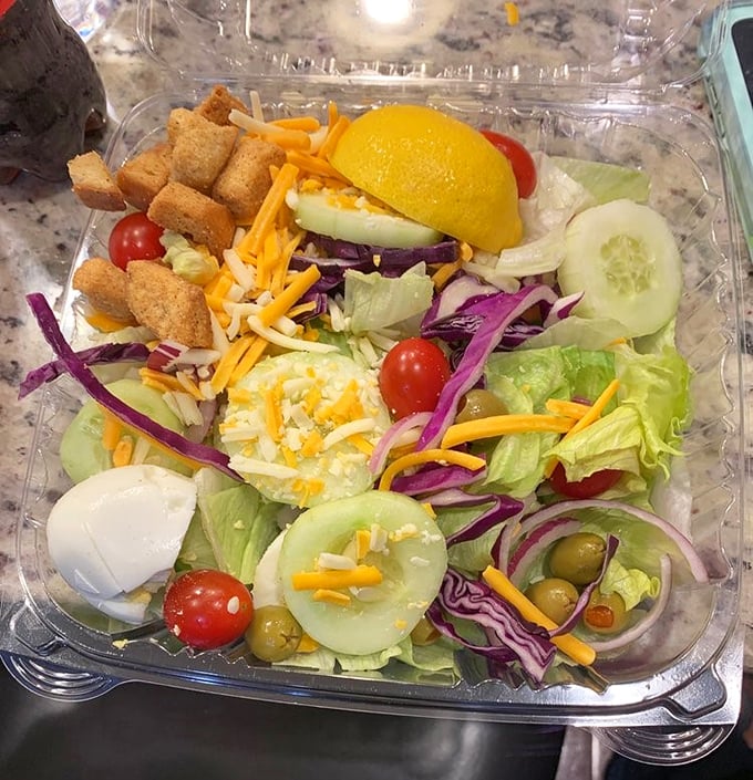 A garden salad that actually looks like a garden—vibrant, colorful, and probably the healthiest decision you'll make all day.